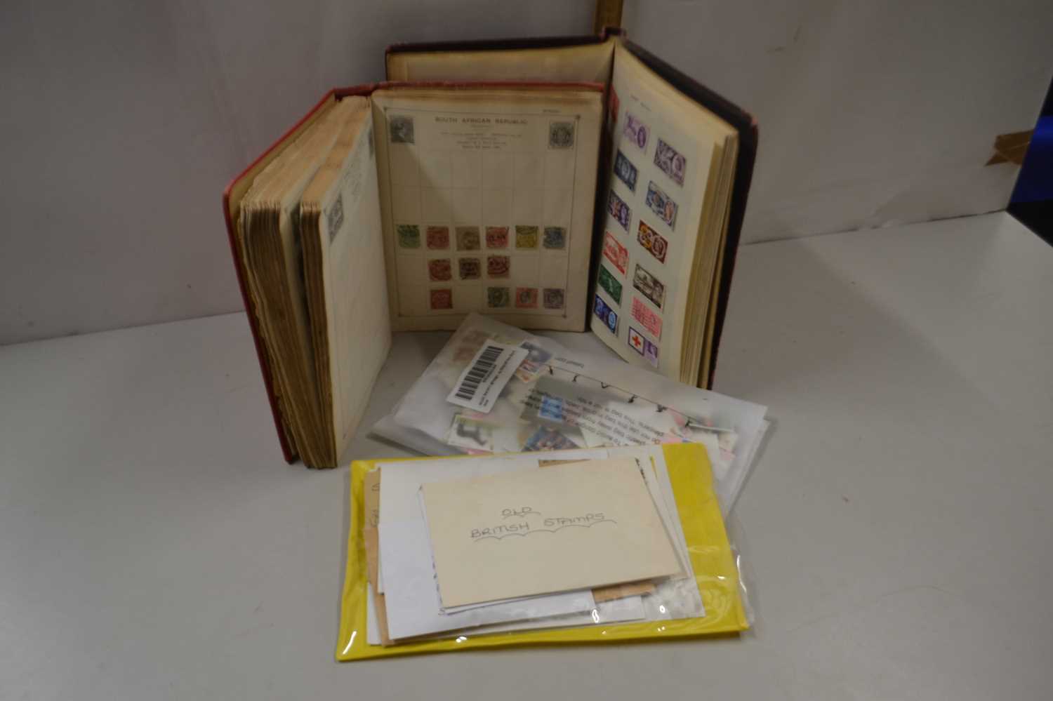 Lot 81 - Two stamp albums and a quantity of stamps