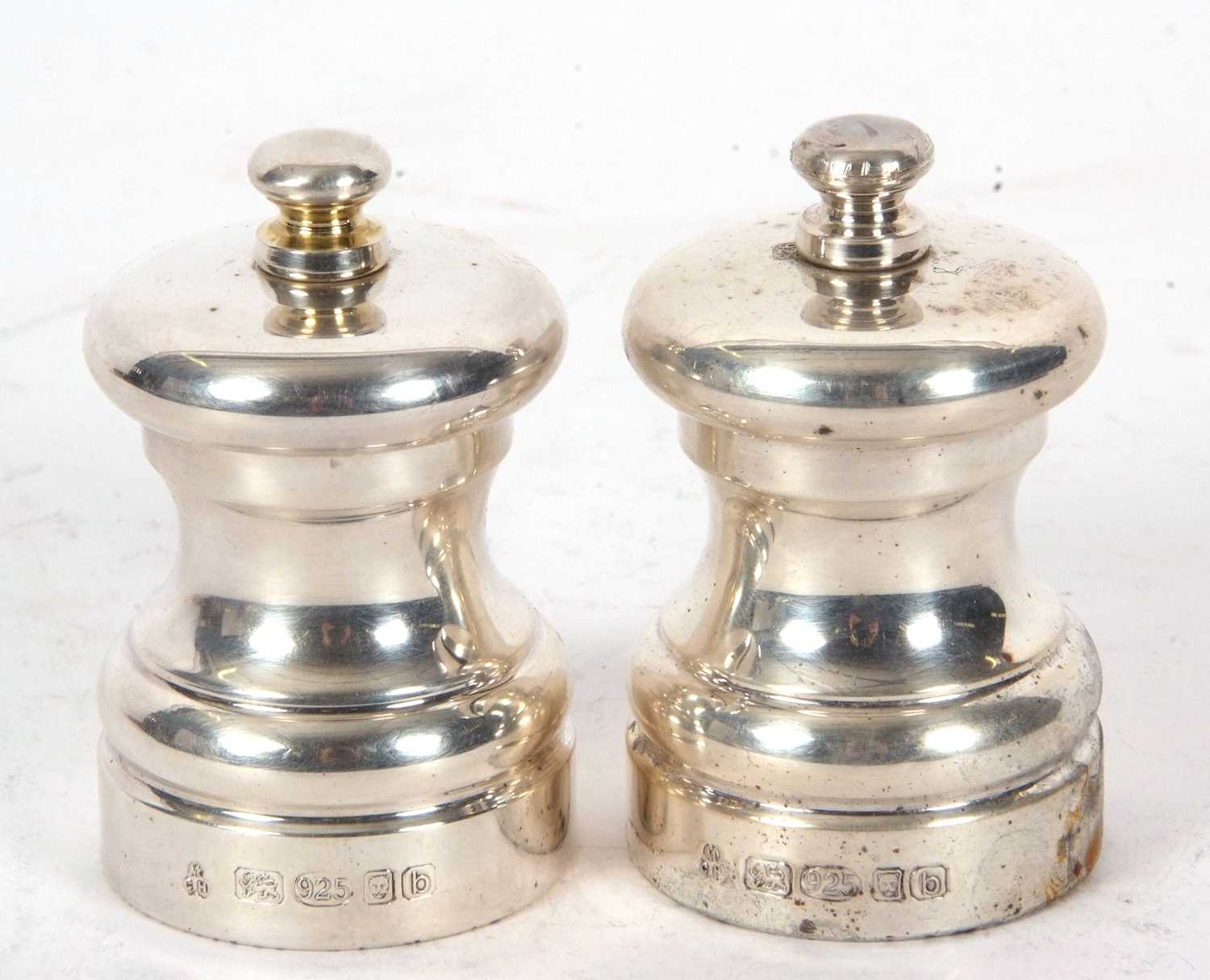 Lot 89 - A pair of Elizabeth II silver salt and pepper