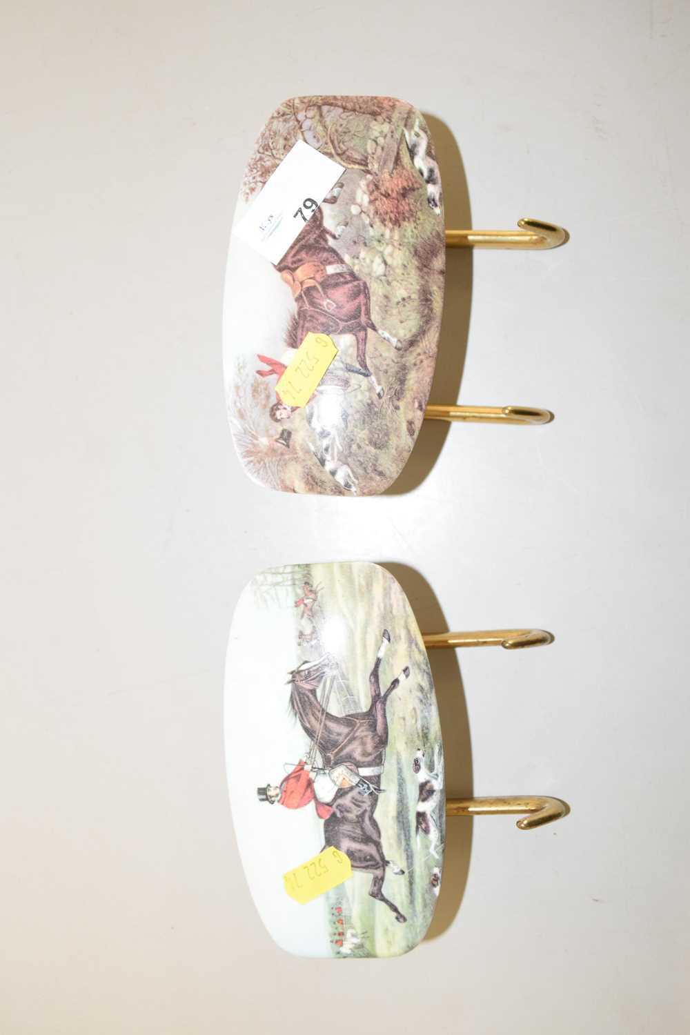 Lot 79 - Pair of hunting themed coat hooks
