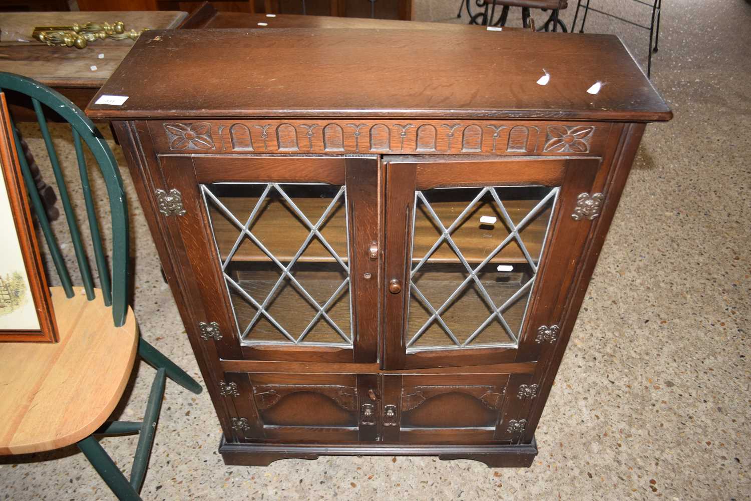 Lot 335 - REPRODUCTION OAK LEAD GLAZED BOOKCASE