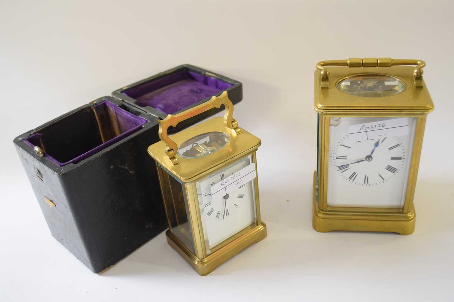 Lot 402 - Two brass carriage clocks, one with original