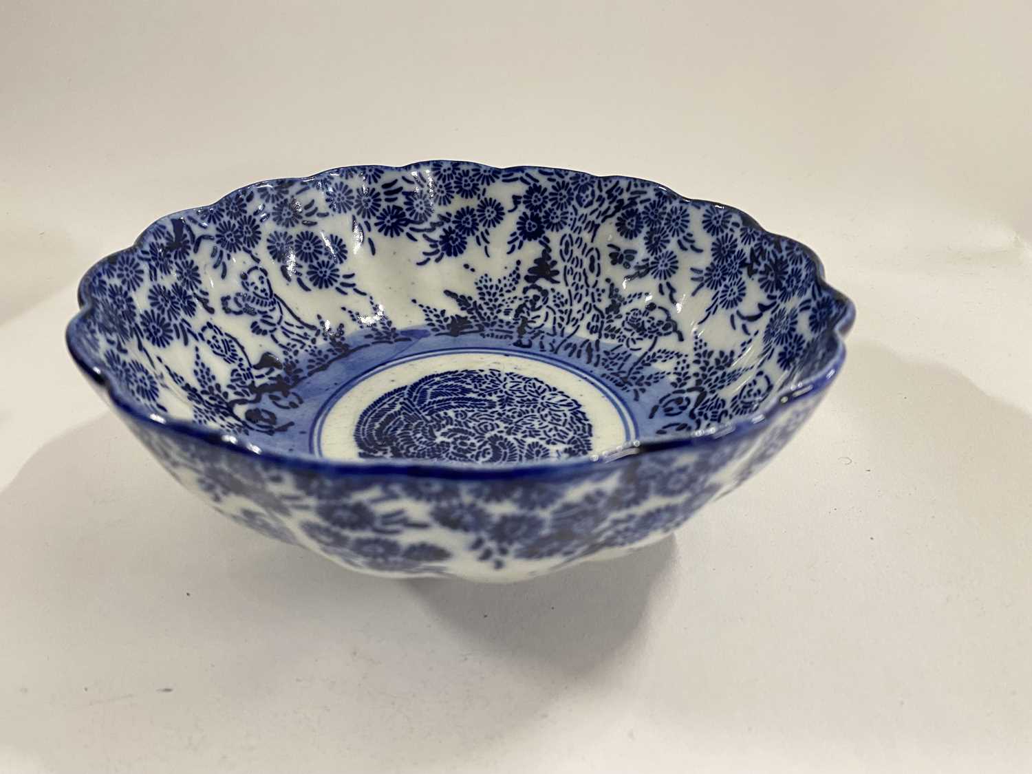 Lot 274 - Japanese porcelain bowl of fluted shape with