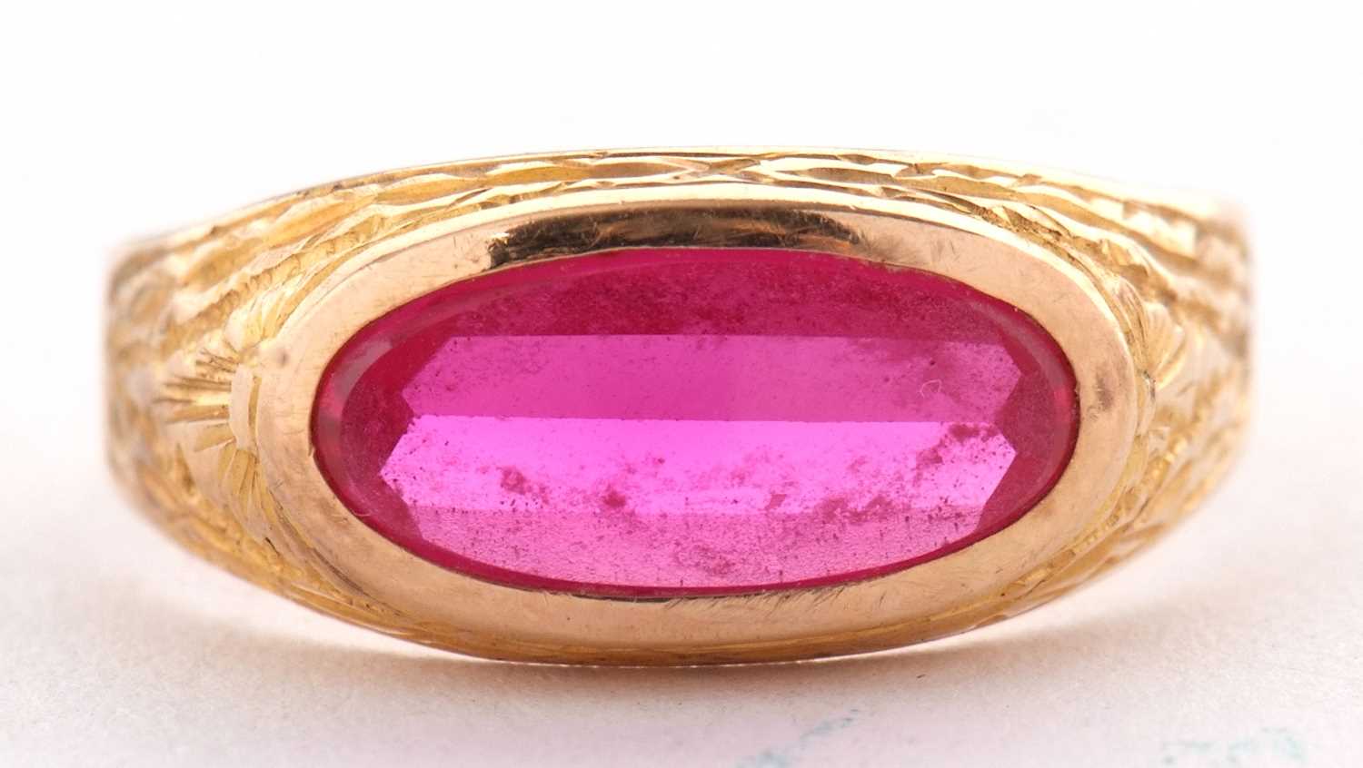 Lot 44 - A continental synthetic ruby ring, the oval